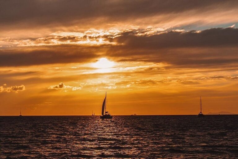 Best Santorini Sunset Cruises (2026) | Eat Drink Travel